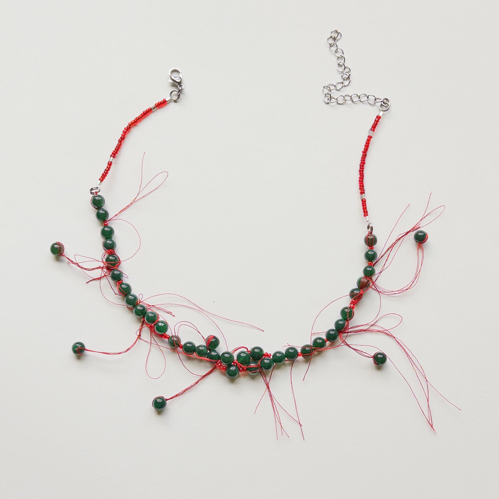 avant garde faux jade beaded necklace with red threads – Sweaty Pigeon